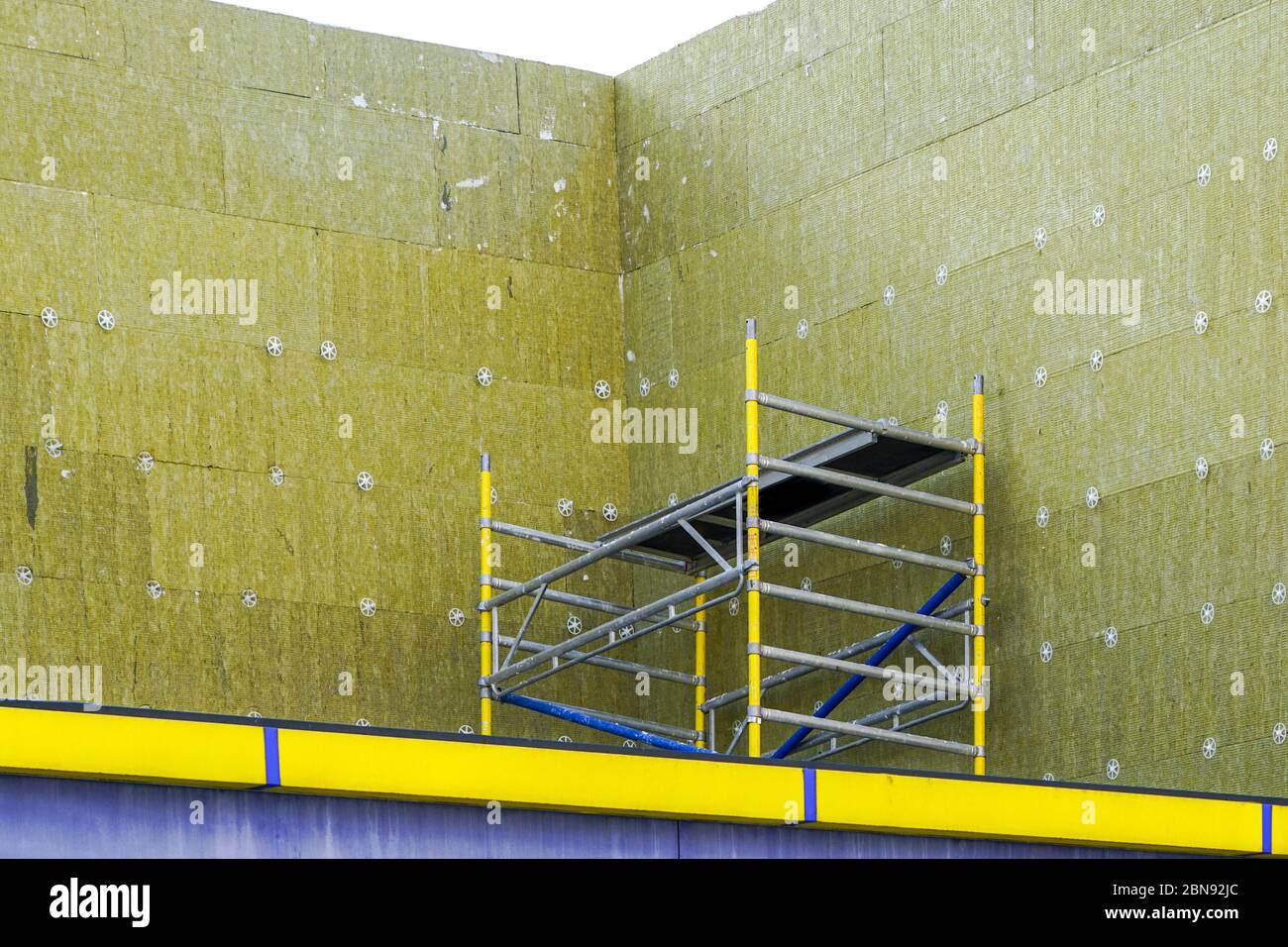 building walls covered with mineral wool slabs for better thermal ...