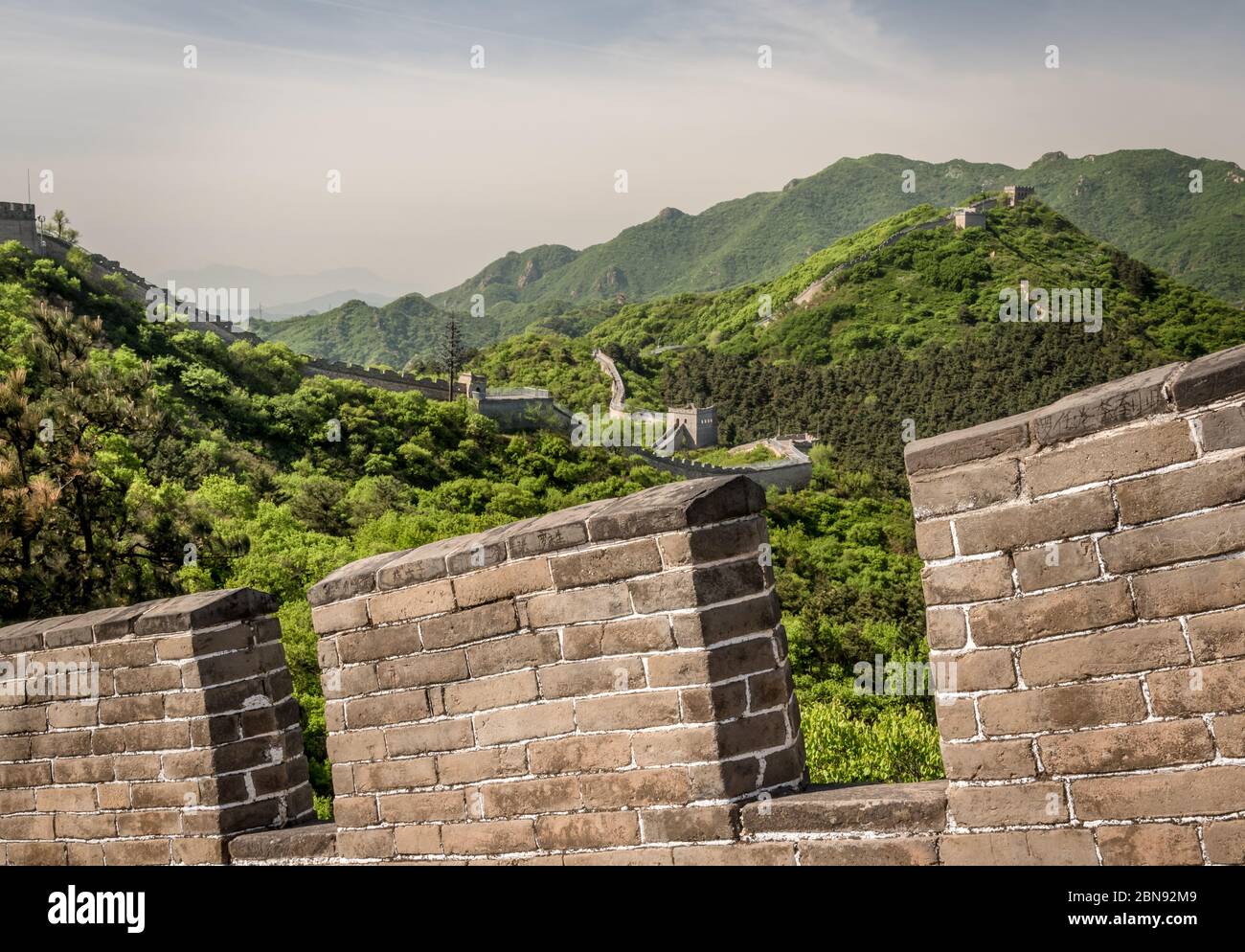 The Great Wall, Badaling with bright spring foliage Stock Photo - Alamy