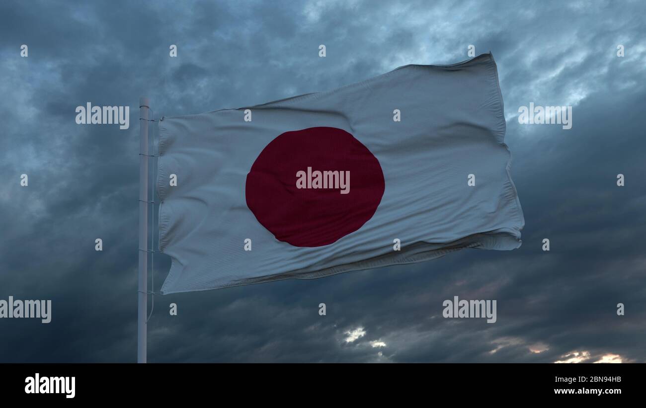 Realistic flag of Japan waving in the wind against deep heavy stormy ...