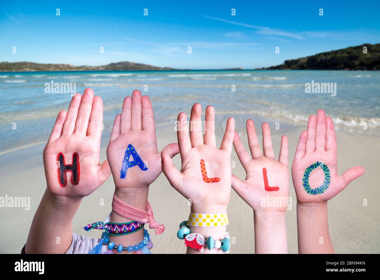 Children Hands Building Word Hallo Means Hello, Ocean Background Stock ...
