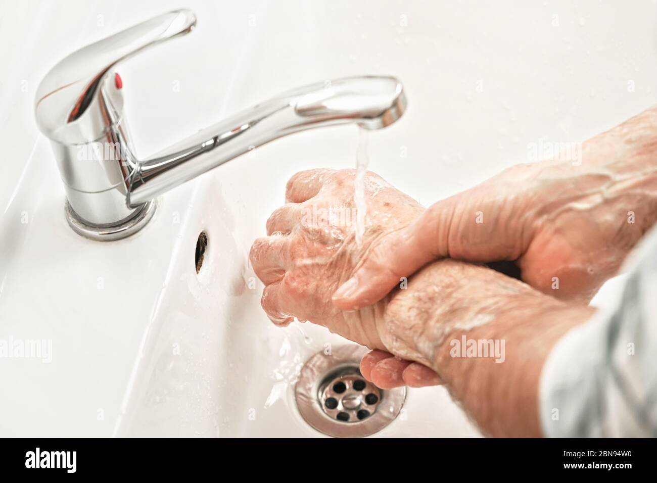 Elderly person wash hi-res stock photography and images - Alamy