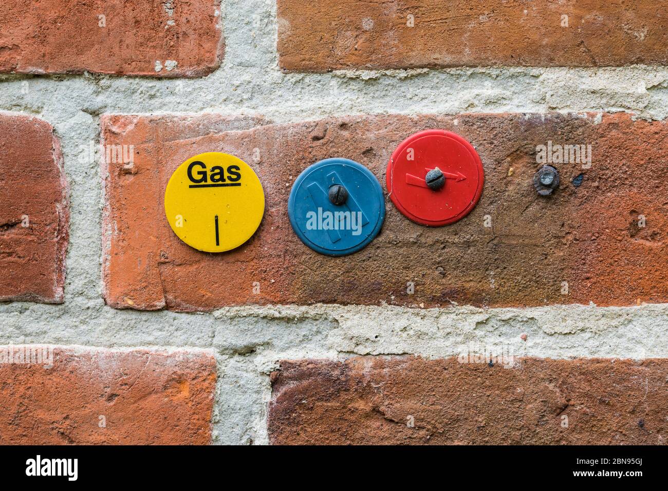 supply signs on a historic wall Stock Photo - Alamy