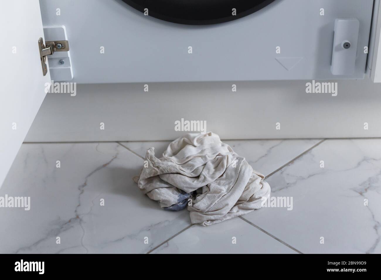 Rags for absorbing spilled water leaked from washing machine built into ...