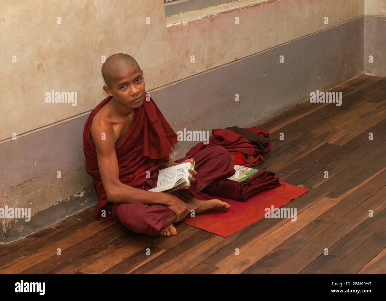 Bagan Myanmar - October 30 2013; Burmese Buddhist Monk sitting alone on ...