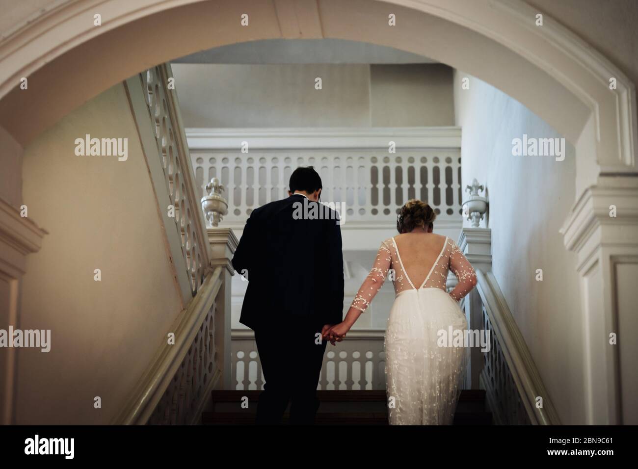 Couple going upstairs hi-res stock photography and images - Alamy