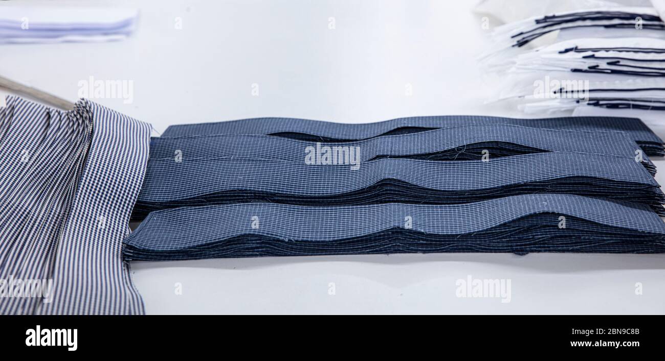 Rolls of natural high fashion fabrics and textiles. Sewing industry ...