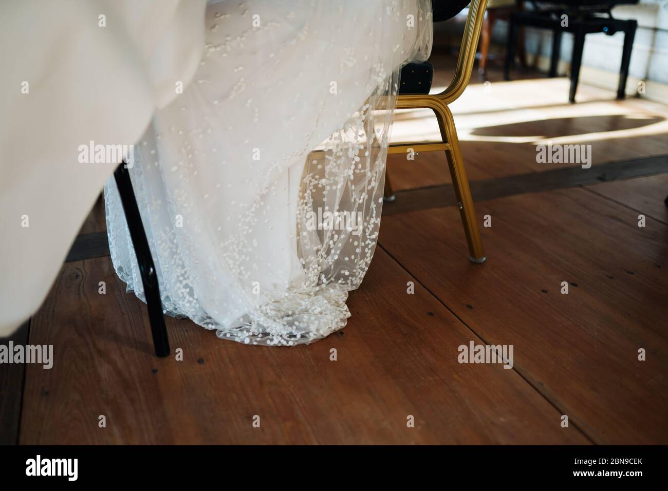 photo of a bride sitting on a chair Stock Photo - Alamy