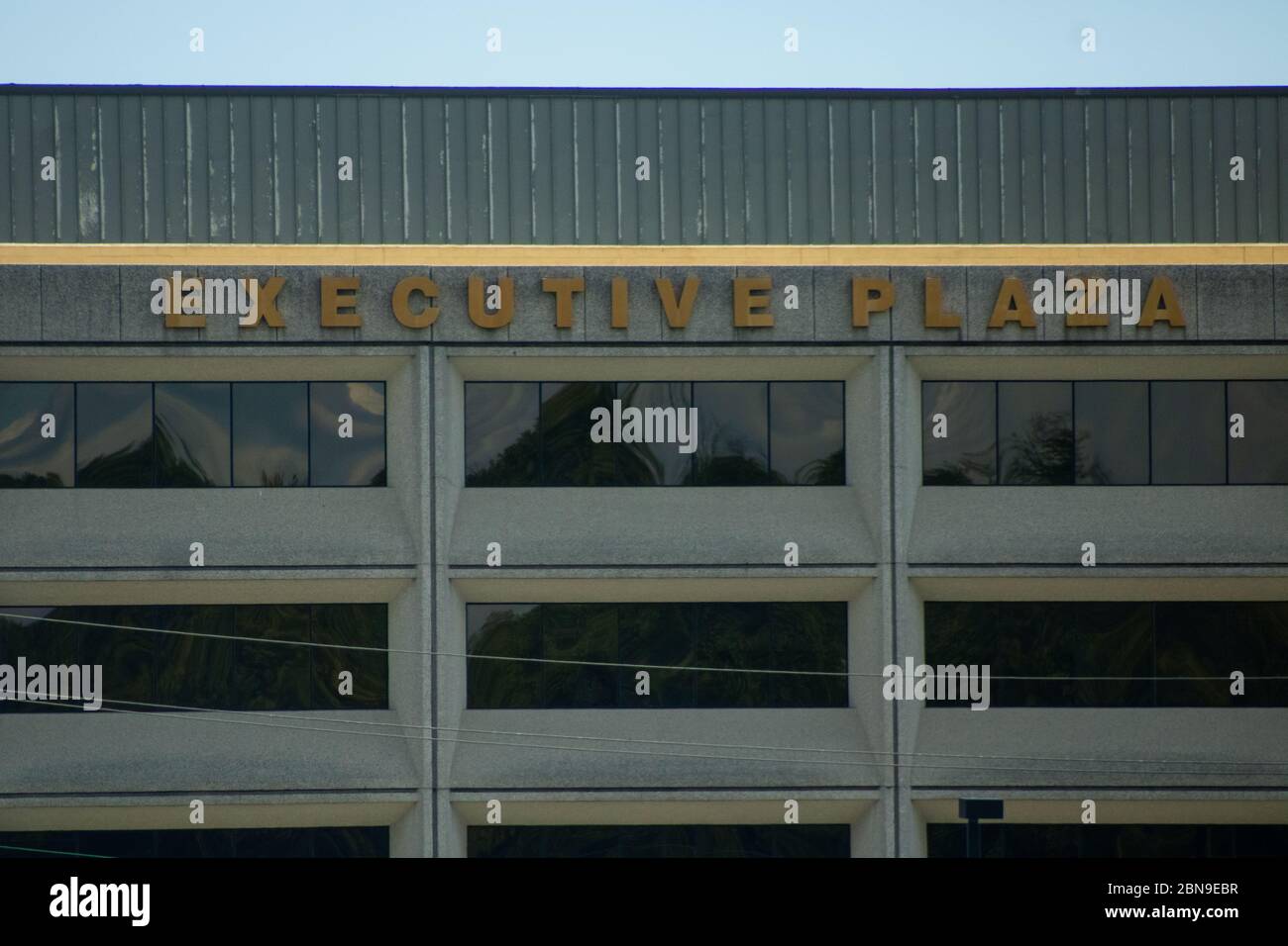 Executive Plaza building sign with gold lettering. This picture was ...
