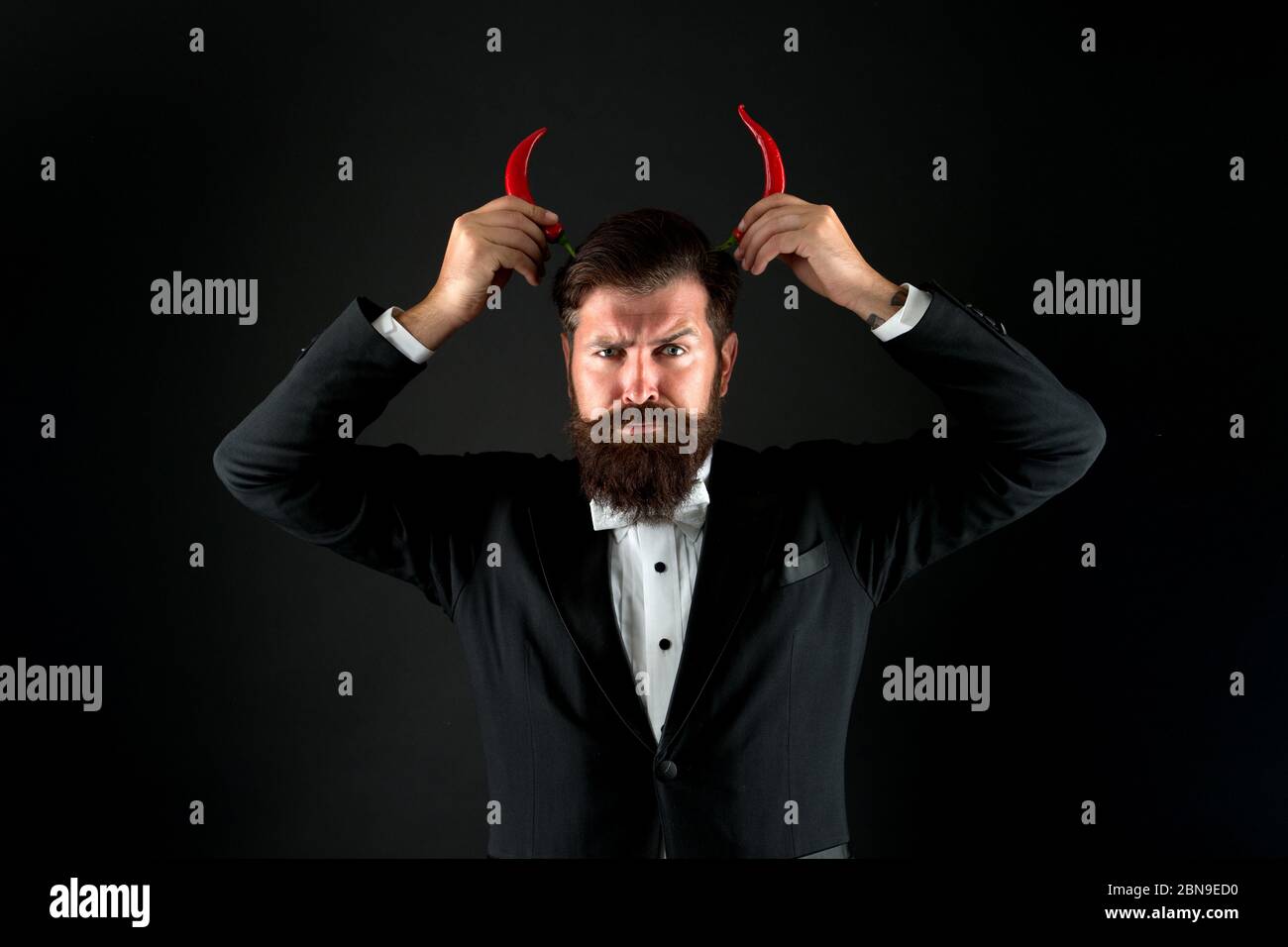 extra strong. Pepper harvest industry. peppery man with devil horns ...