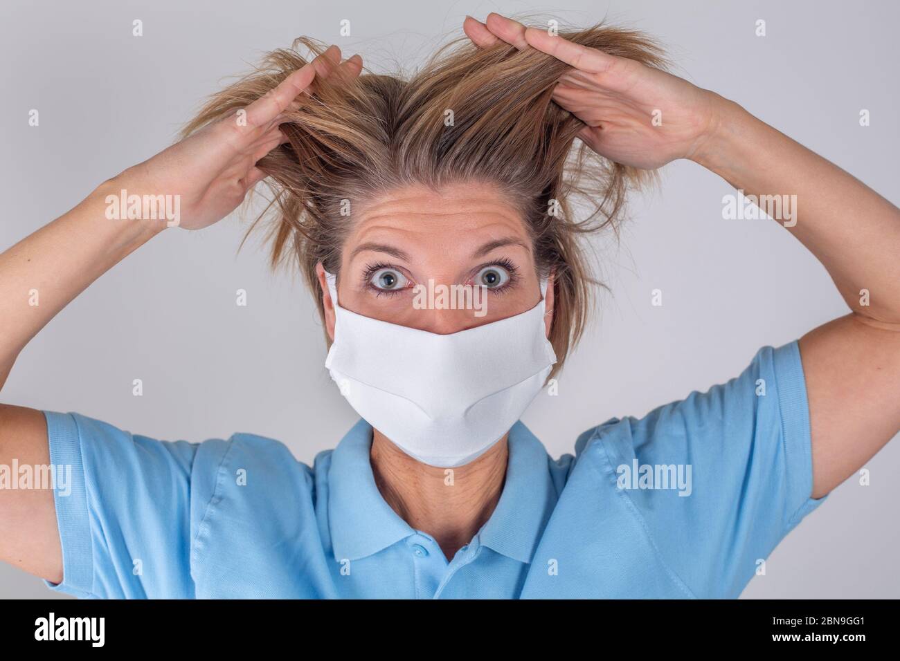 Portrait of confused woman wearing a face mask Stock Photo - Alamy