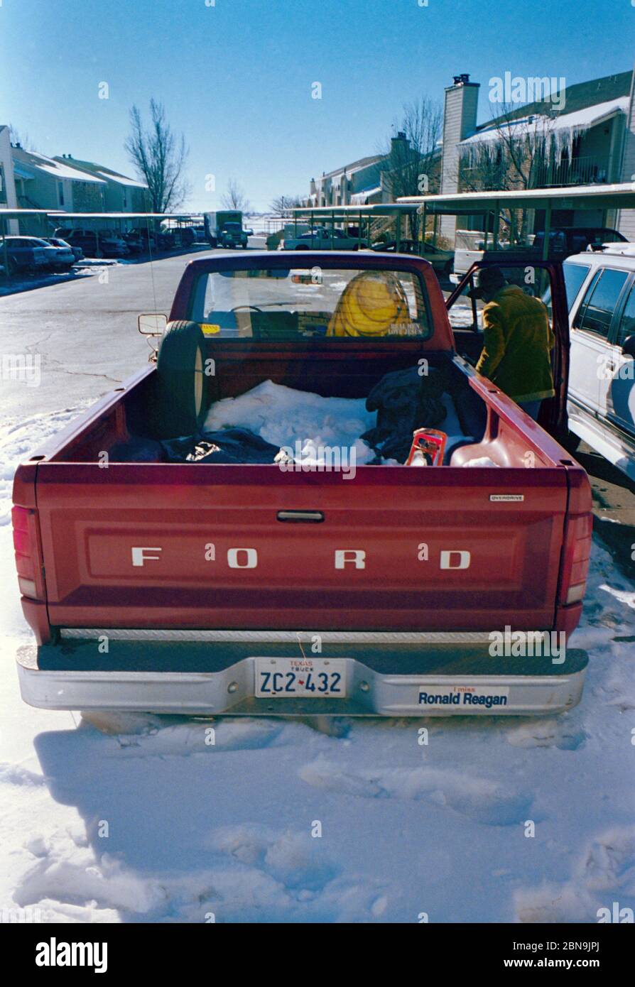 Man opening door of old Red Ford Pick Up Truck 2000-2001 Stock Photo ...