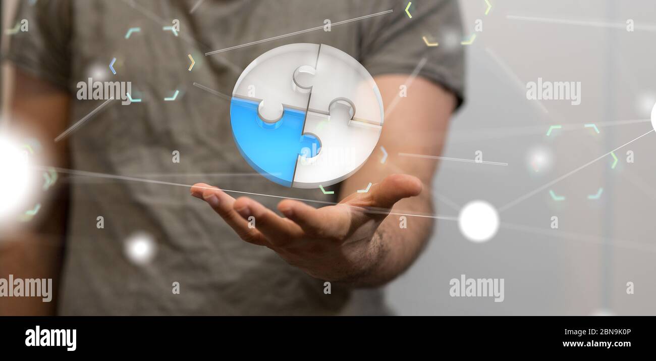 A puzzle hand solution concept business Stock Photo - Alamy