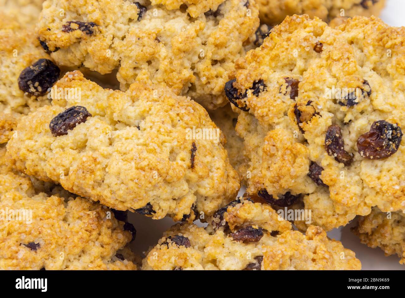 A pile of traditional delicious fresh golden home baked rock cakes with ...