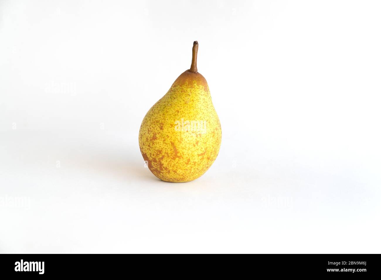 yellow pear isolated on white background Stock Photo - Alamy