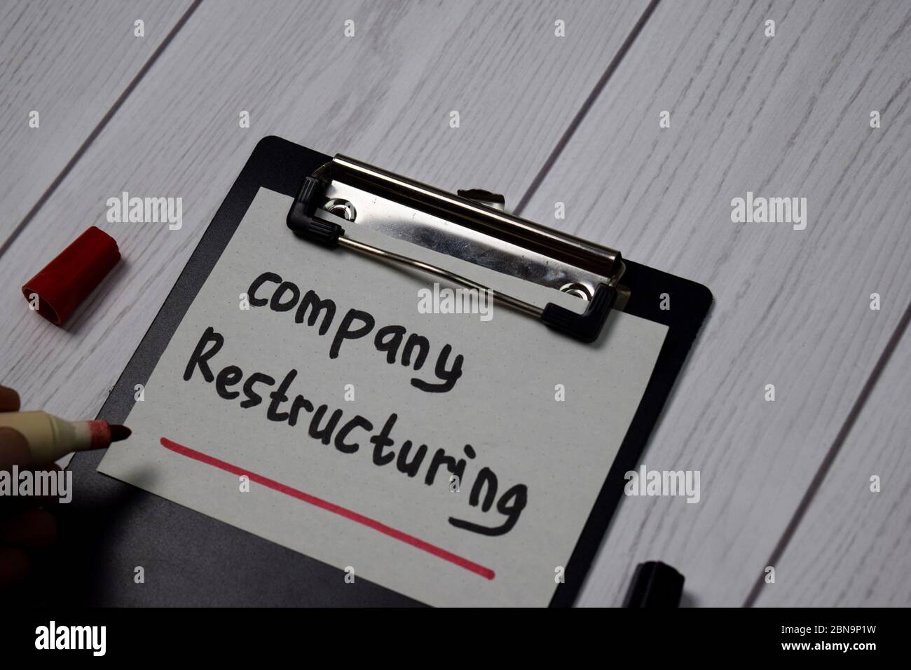 Company Restructuring write on paperwork isolated on office desk Stock ...