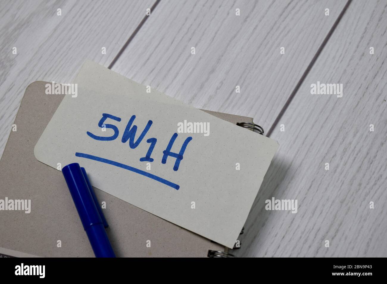 5W1H write on sticky notes isolated on office desk Stock Photo - Alamy