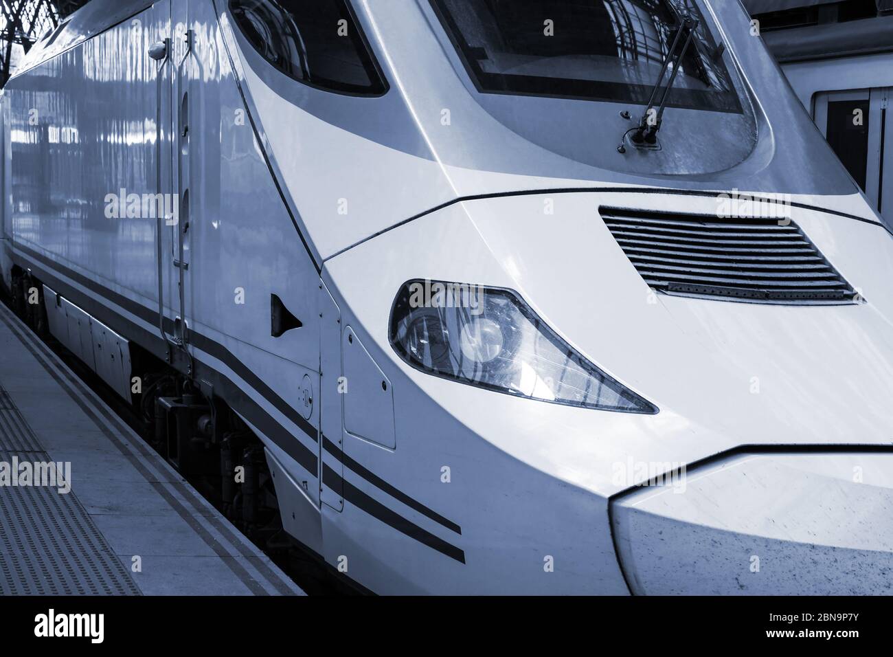 modern high-speed train at the railway station Stock Photo - Alamy