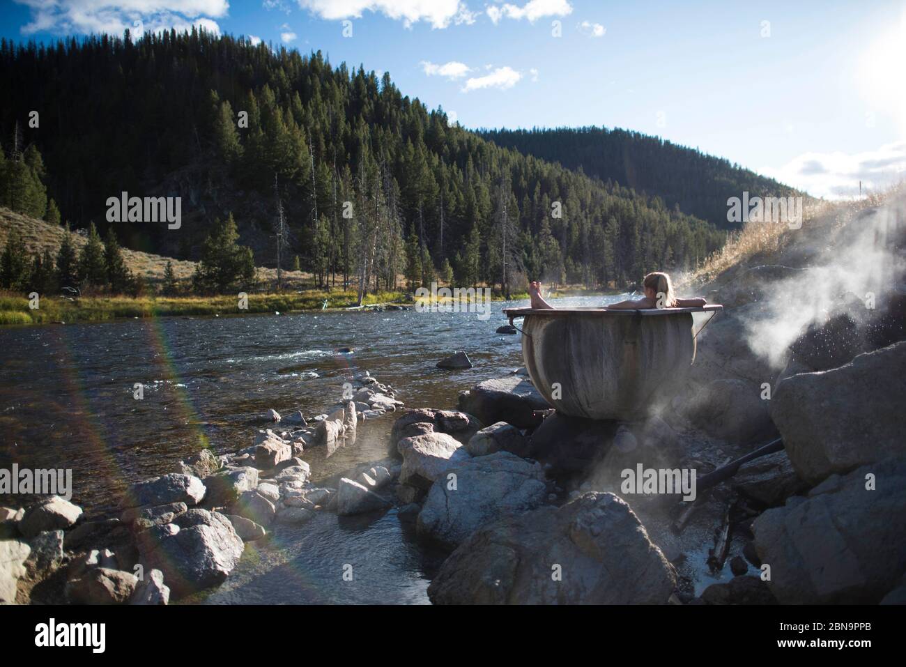 A woman enjoying a dip in the hot springs, Idaho Stock Photo - Alamy