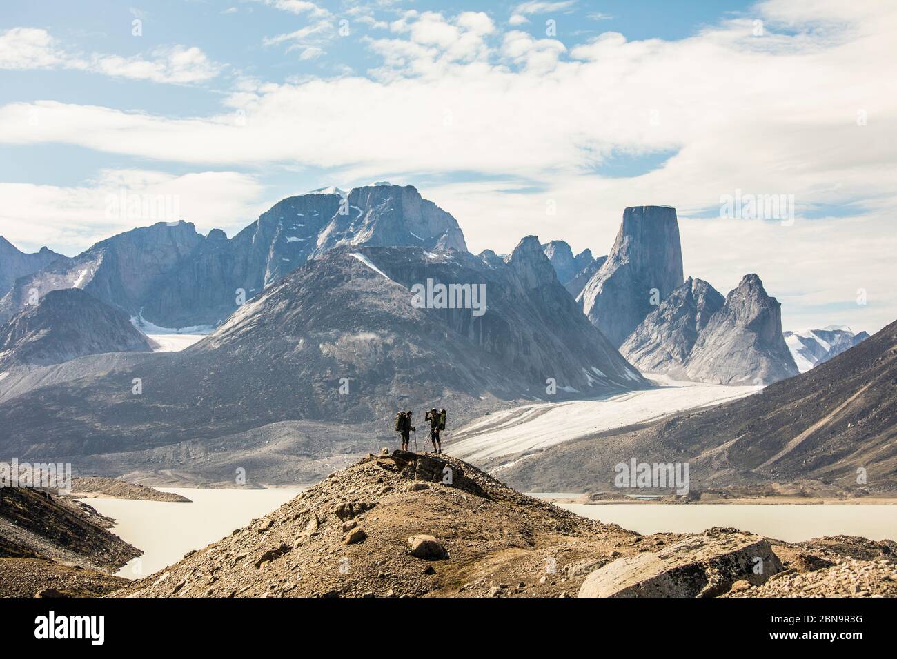 Two climbers on summit ridge hi-res stock photography and images - Alamy
