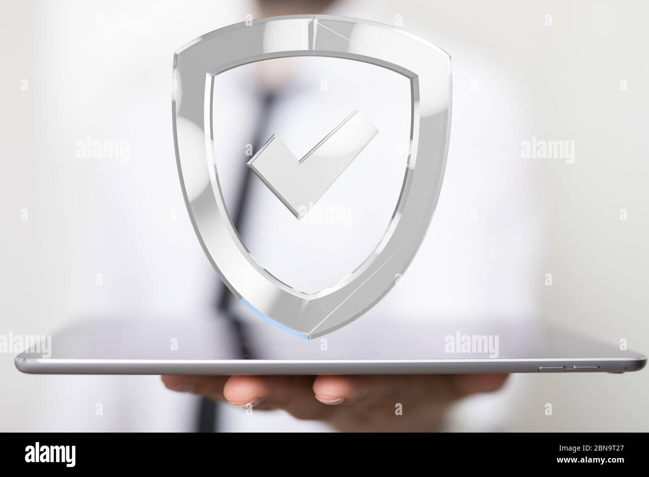 A shield protection concept holding in hand 3d Stock Photo - Alamy