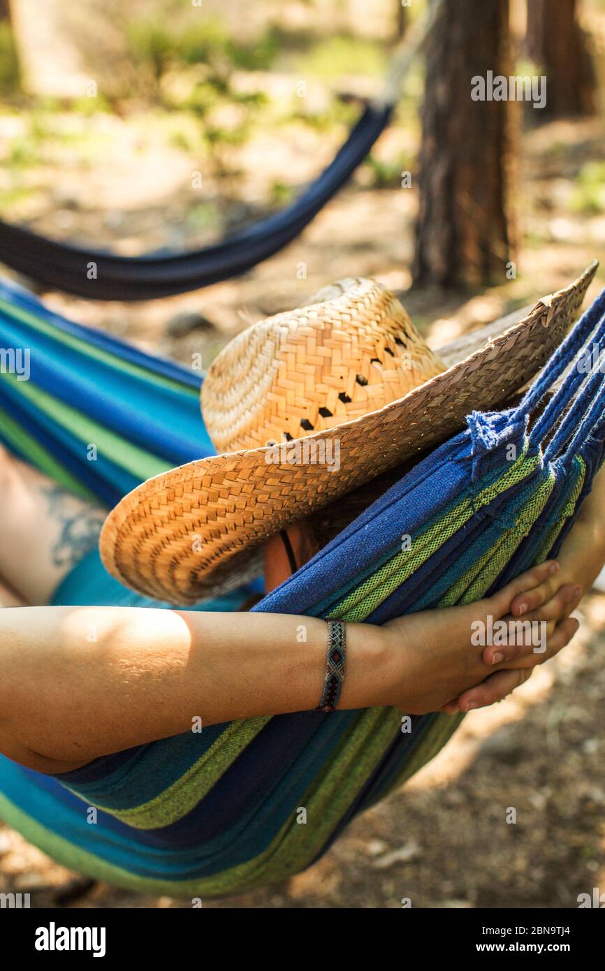 Hat over face hi-res stock photography and images - Alamy