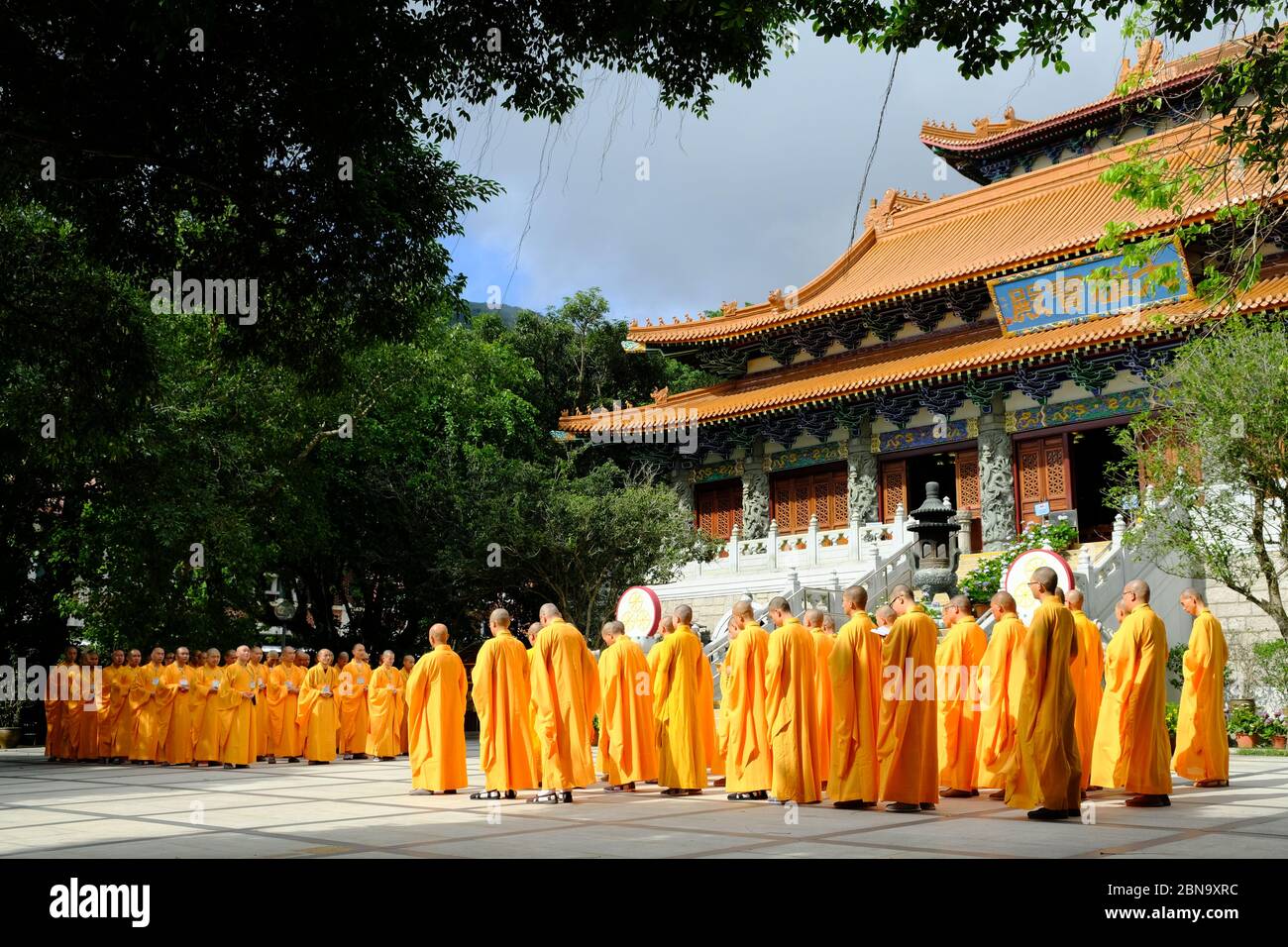 Hong Kong China - Po Lin Monastery main square with monks Stock Photo ...