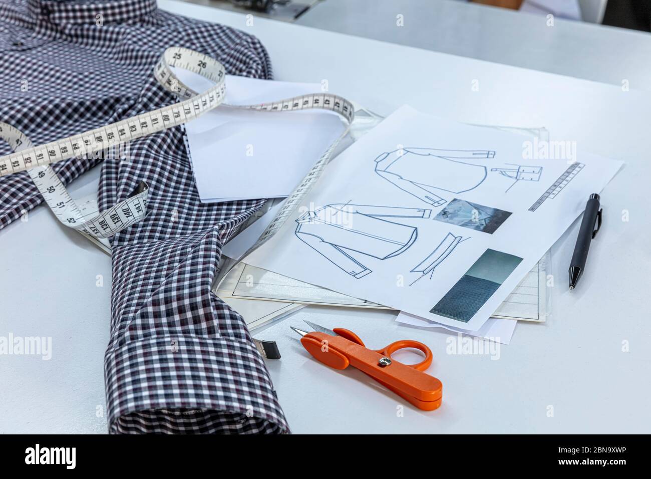 Dressmaking and fashion collection background. Drawn sketches, sewing ...
