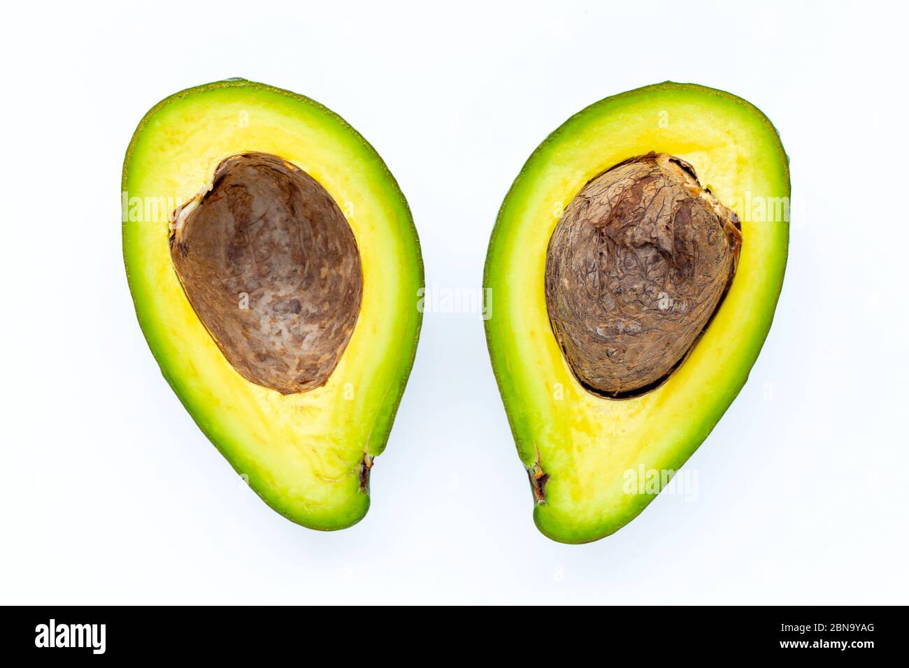 Avocado on a white background Stock Photo - Alamy
