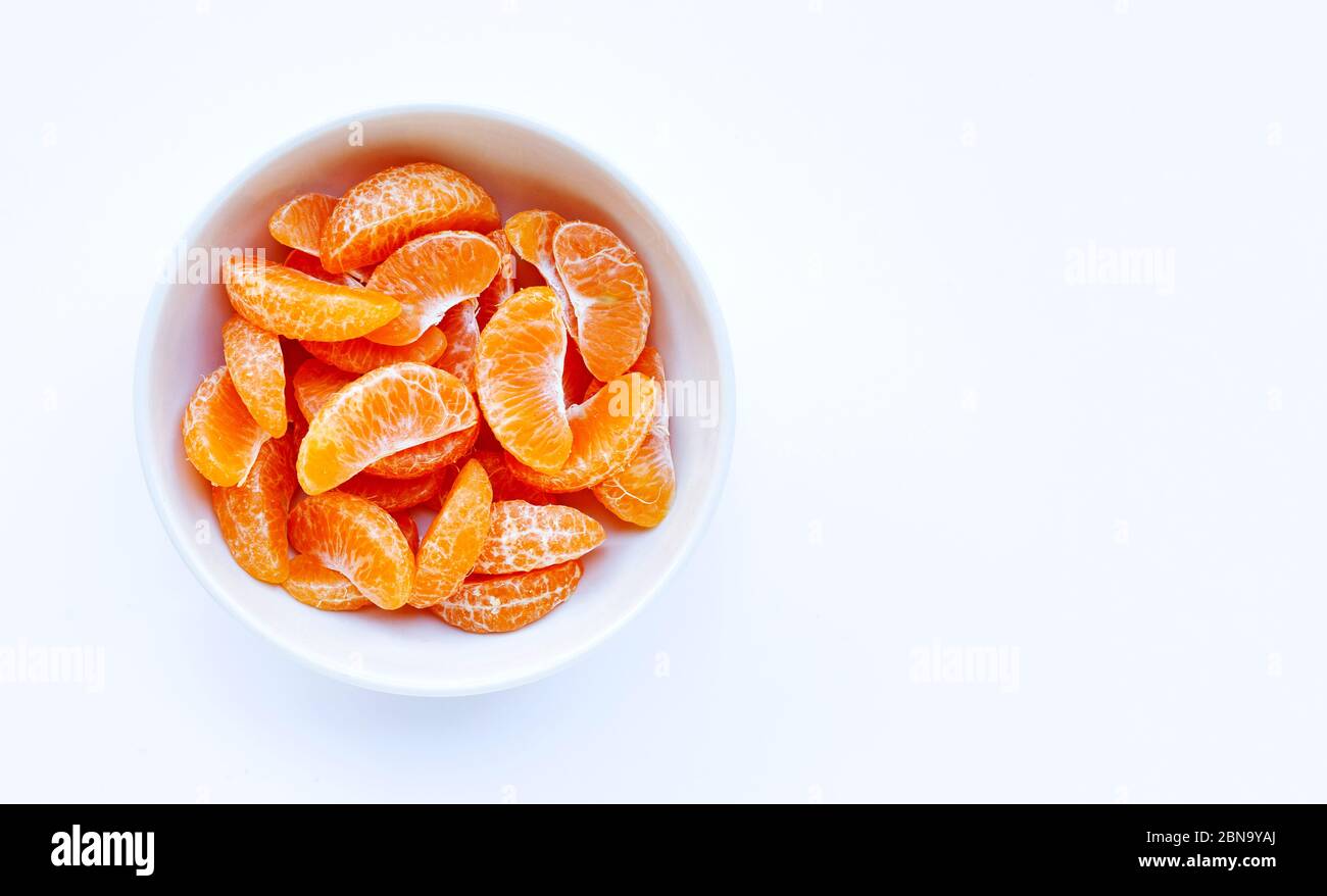 Mandarin segments, Fresh orange isolated on white background. Copy ...