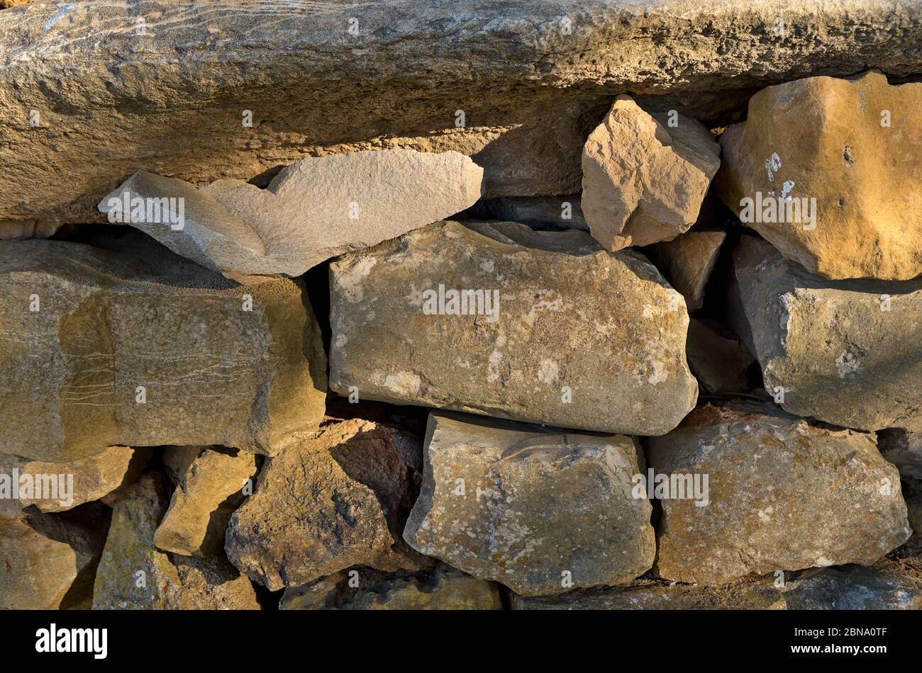 Rustic stone wall. Backgrounds and textures Stock Photo - Alamy