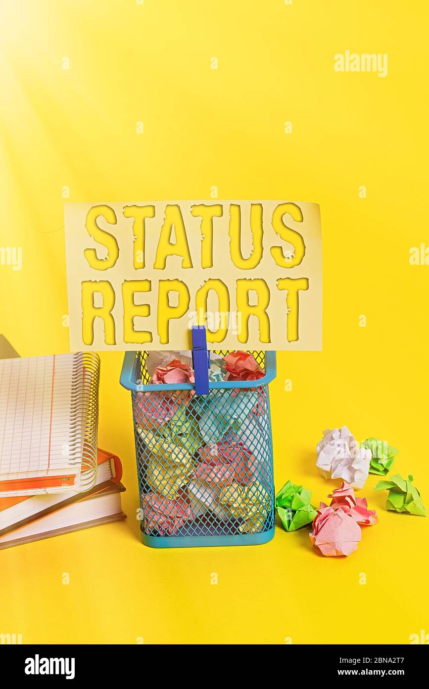 Writing note showing Status Report. Business concept for Update Summary ...