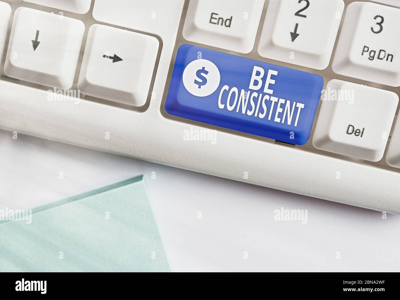 Writing note showing Be Consistent. Business concept for Uniform ...