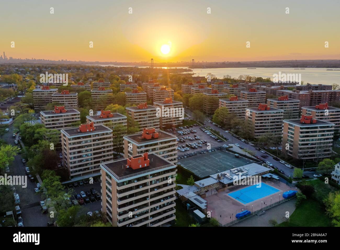Aerial view of Queens in New York City at sunset with the George ...