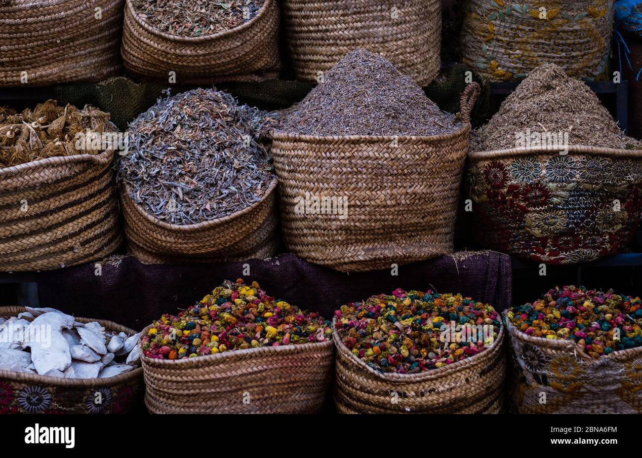 Baskets full of candies and condiments in the market Stock Photo - Alamy