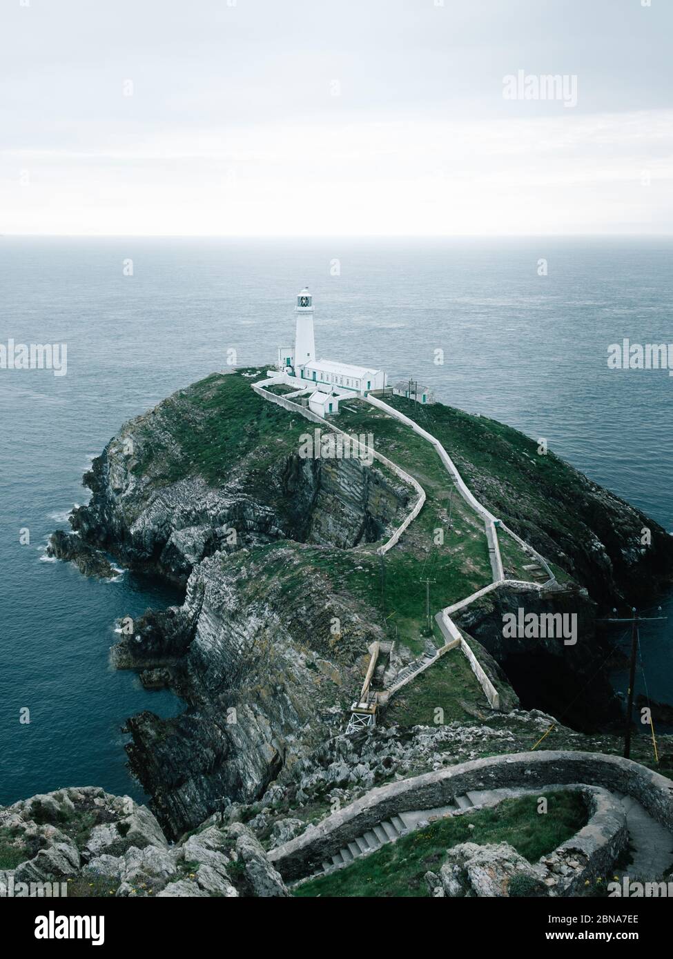 Shot of the lighthouse on the cliff in RSPB South Stack Cliff, Anglesey ...