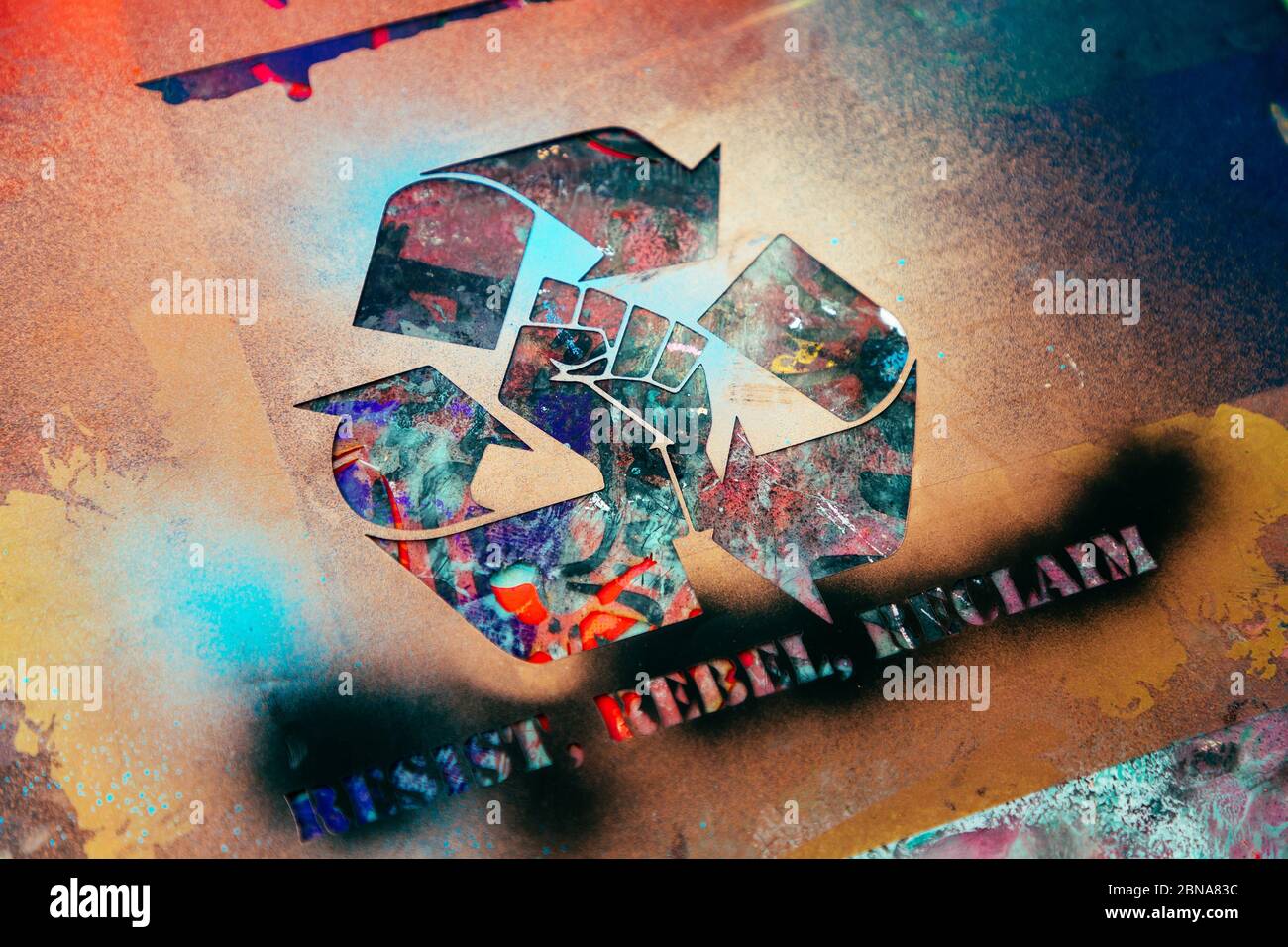 A close up shot of a Resit, Rebel, Reclaim Recycle Plastic sign Stock ...