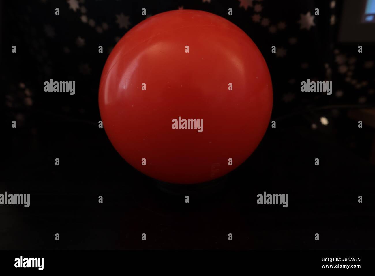 Closeup shot of a small red ball with a blurry background Stock Photo ...