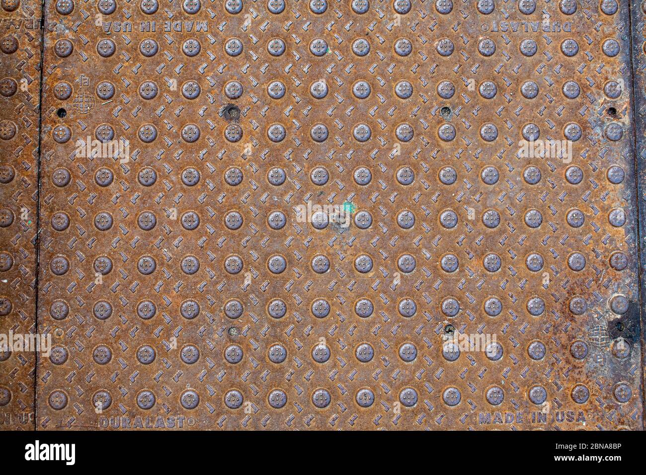Overhead shot of metal rusty ground with "Made in USA" on the right ...
