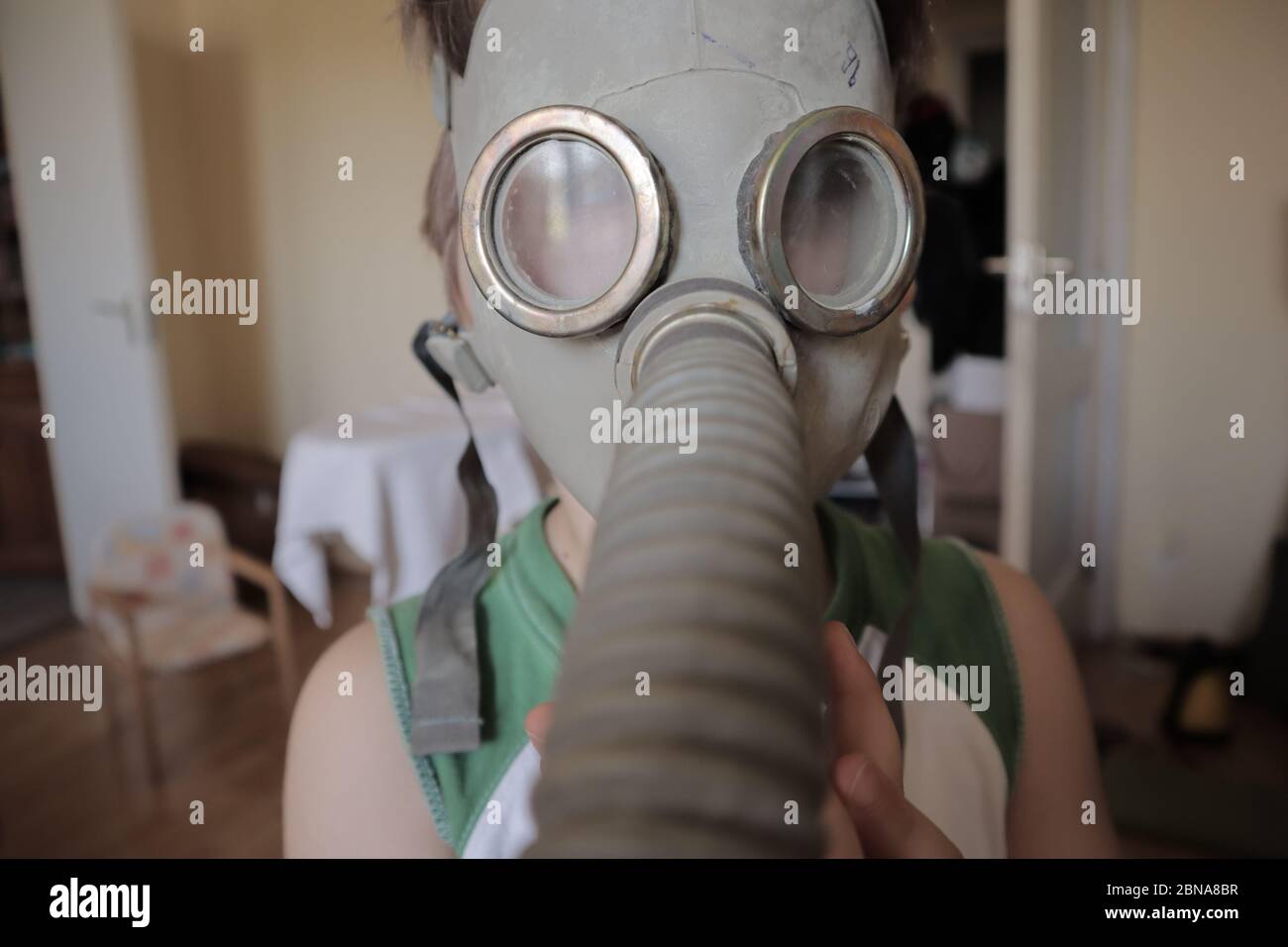 Boy wearing gas mask hi-res stock photography and images - Alamy