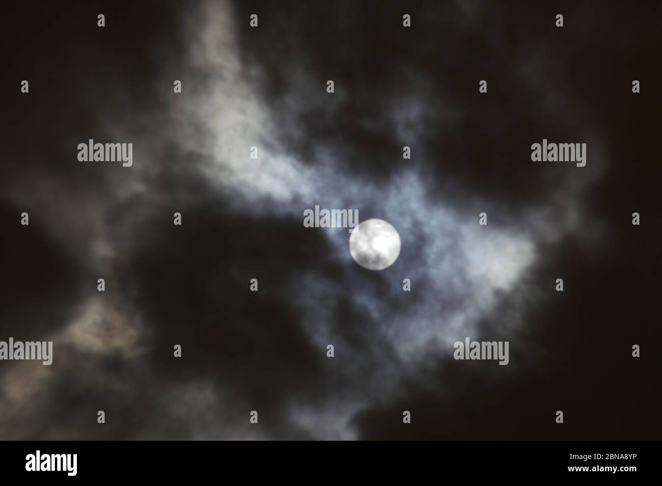 Full moon hidden by clouds hi-res stock photography and images - Alamy