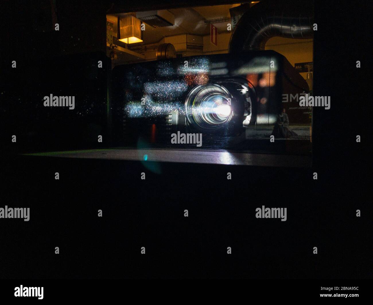 Closeup of a projector in a dark room Stock Photo - Alamy