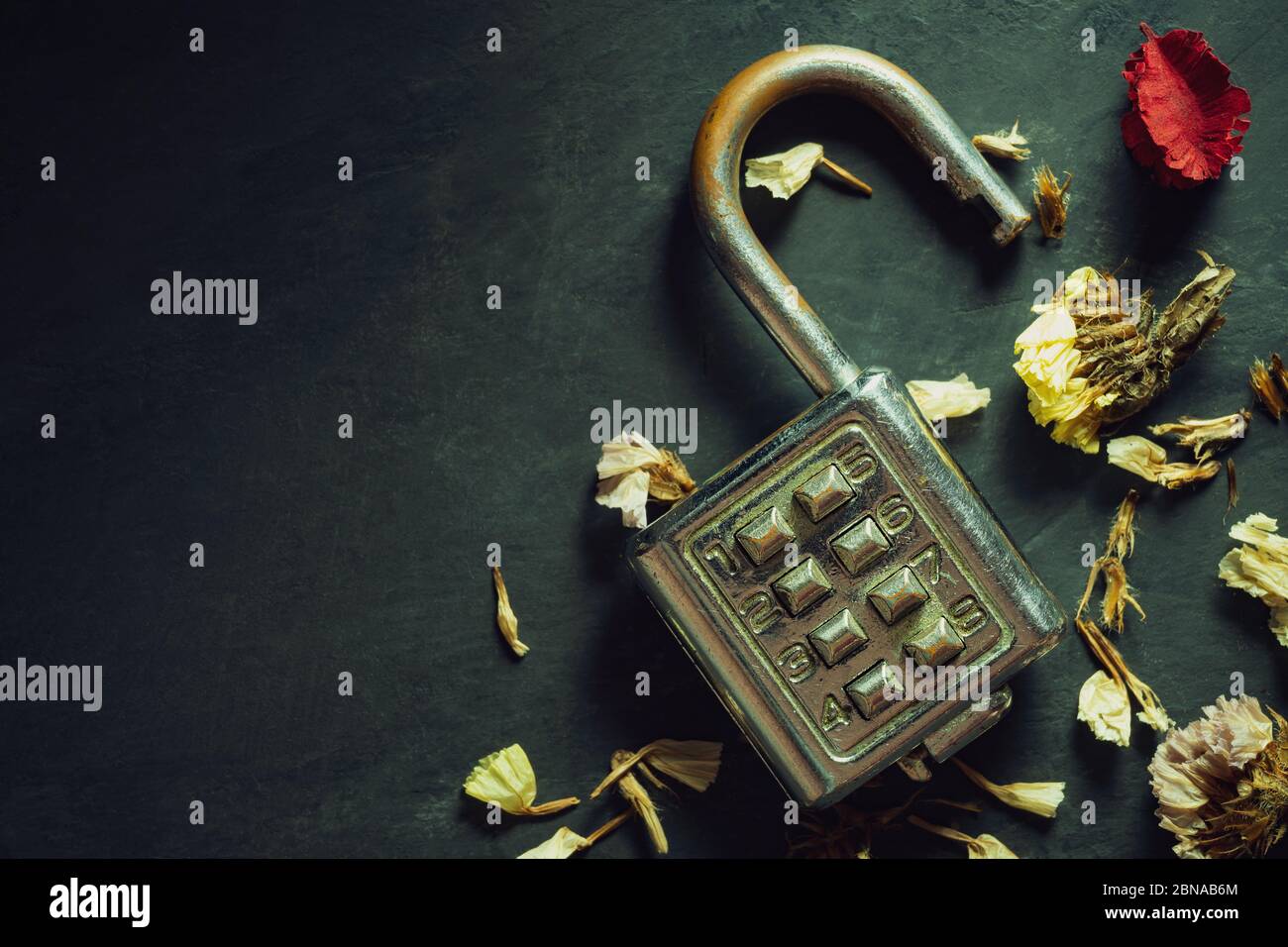 Combination padlock on blackboard background. Top view and copy space ...