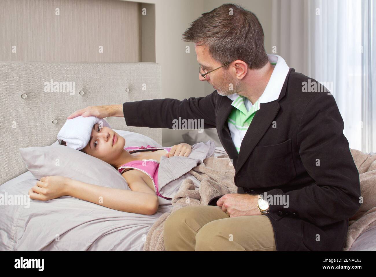 Worried Parent Sick Child High Resolution Stock Photography and Images ...