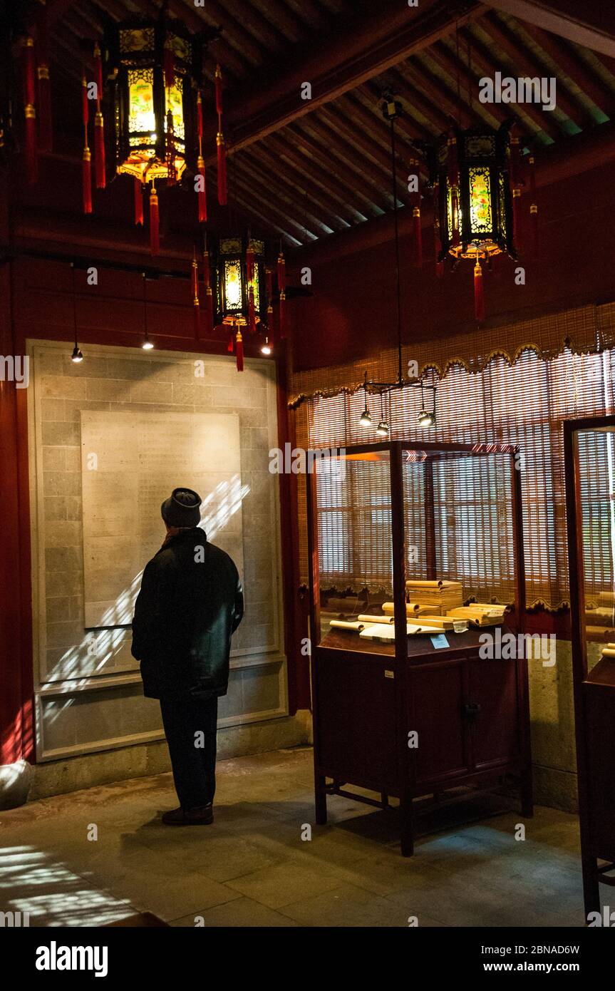An old man reads a display in the Tianyi Pavilion, China's oldest ...