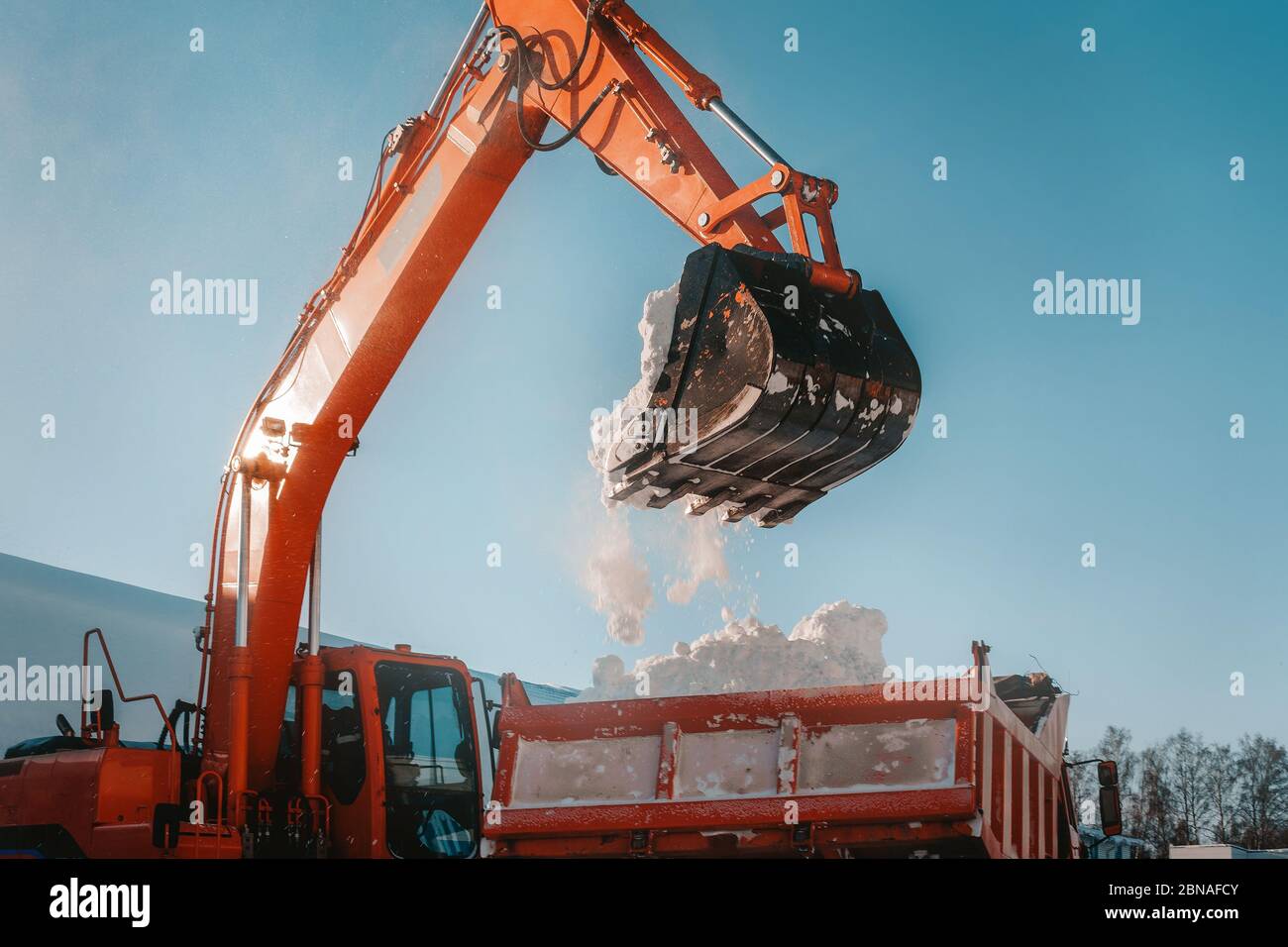Excavator loads a truck hi-res stock photography and images - Alamy