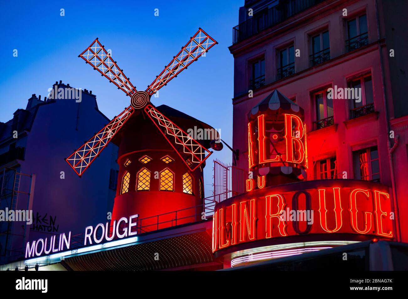 PARIS, FRANCE - Jun 15, 2019: View of the Moulin Rouge club at night ...