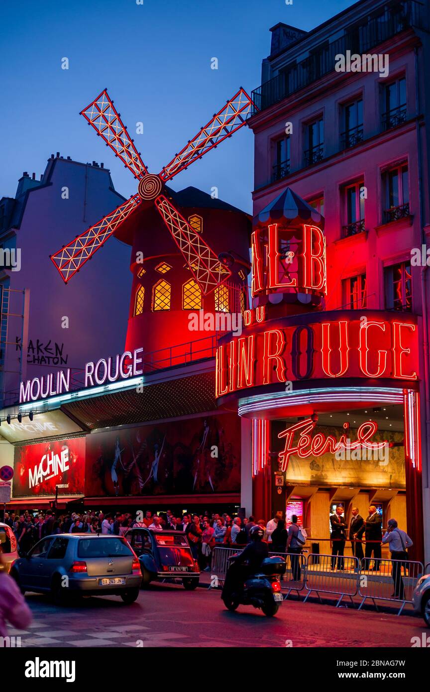 PARIS, FRANCE - Jun 15, 2019: View of the Moulin Rouge club at night ...