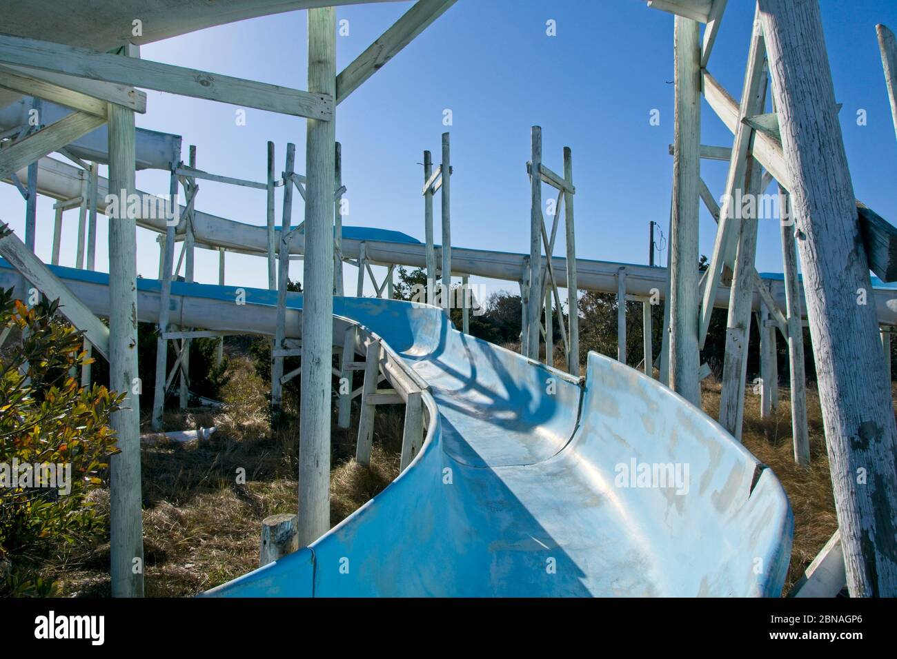 Old blue abandoned water slide Stock Photo - Alamy