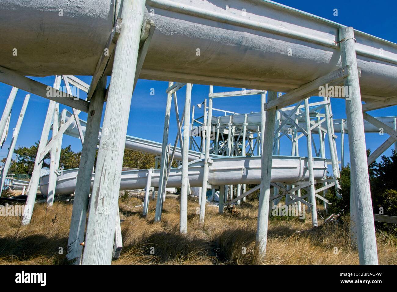 Old blue abandoned water slide Stock Photo - Alamy