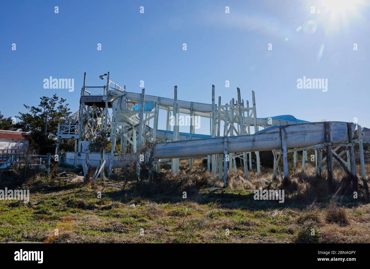 Old blue abandoned water slide Stock Photo - Alamy